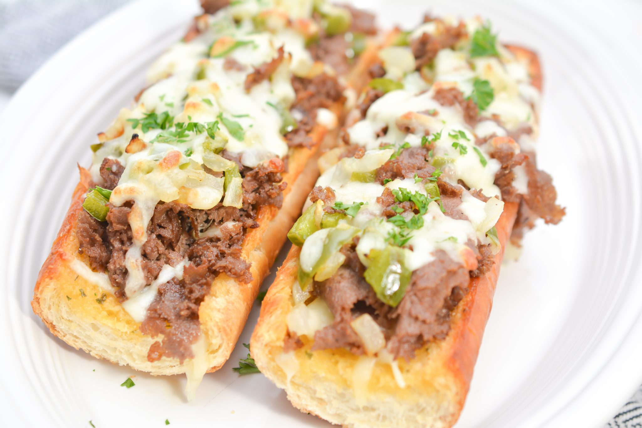 French Garlic Philly Cheesesteak Bread - Sweet Pea's Kitchen